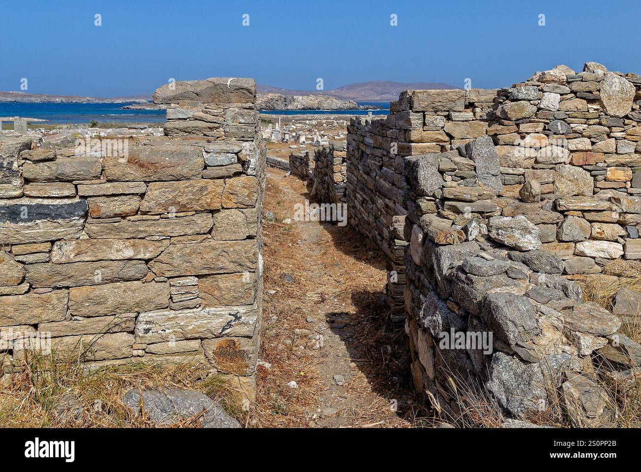 Ancient Stone Walls With a Scenic Coastal View and Blue Sky Stock Photo ...