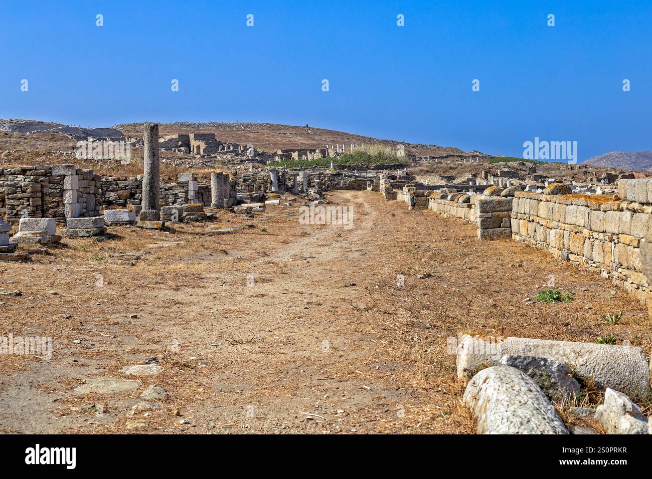 Ancient Stone Ruins in a Scenic Desert Landscape with Blue Sky Backdrop ...