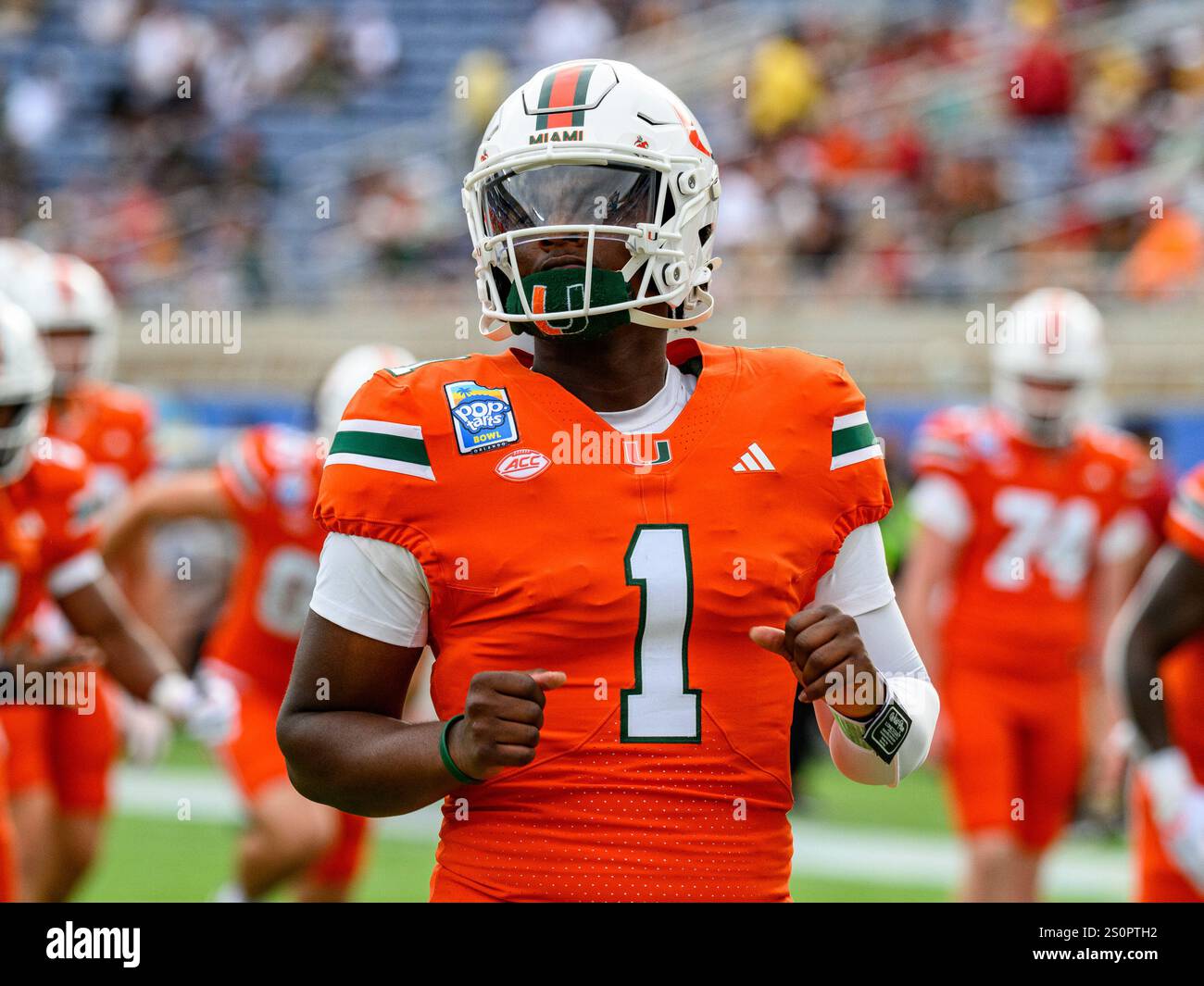 Orlando, FL, USA. 28th Dec, 2024. Miami Hurricanes quarterback Cam Ward ...