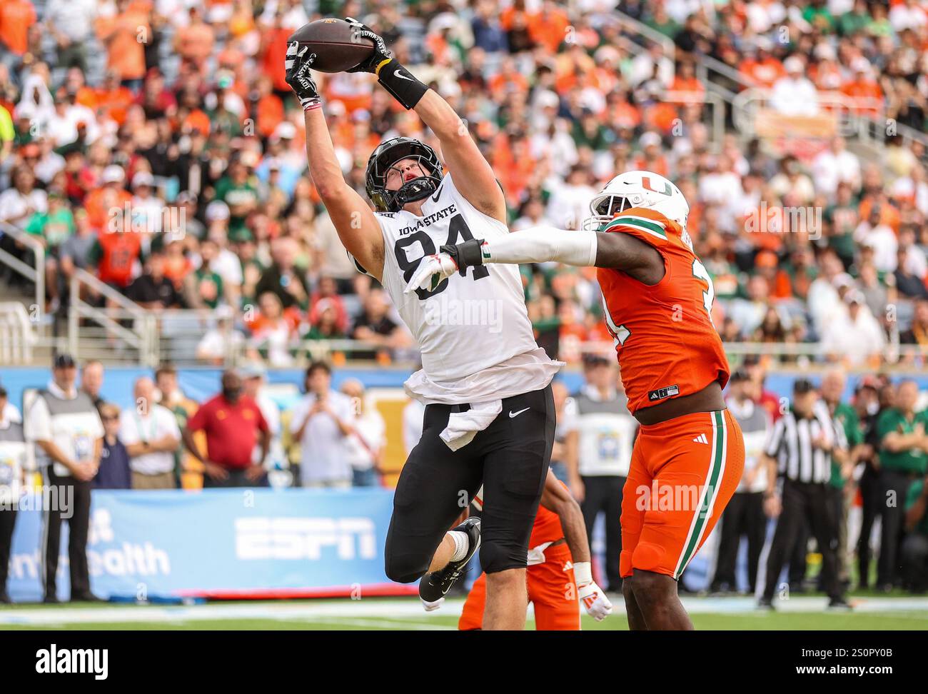 Orlando, FL, USA. 28th Dec, 2024. Iowa State's Gabe Burkle (84) catches ...