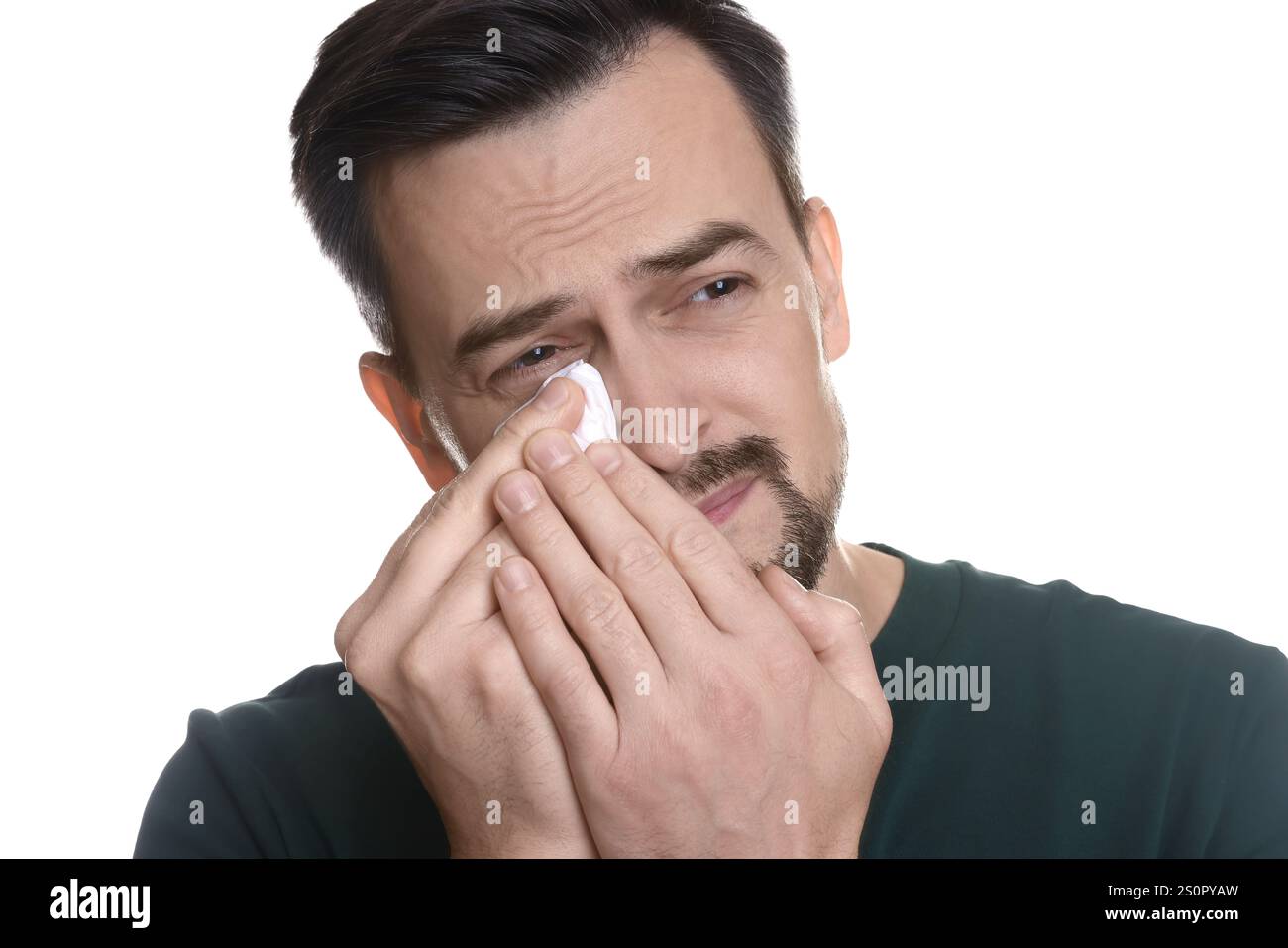 Sad man with paper tissue crying on white background Stock Photo - Alamy