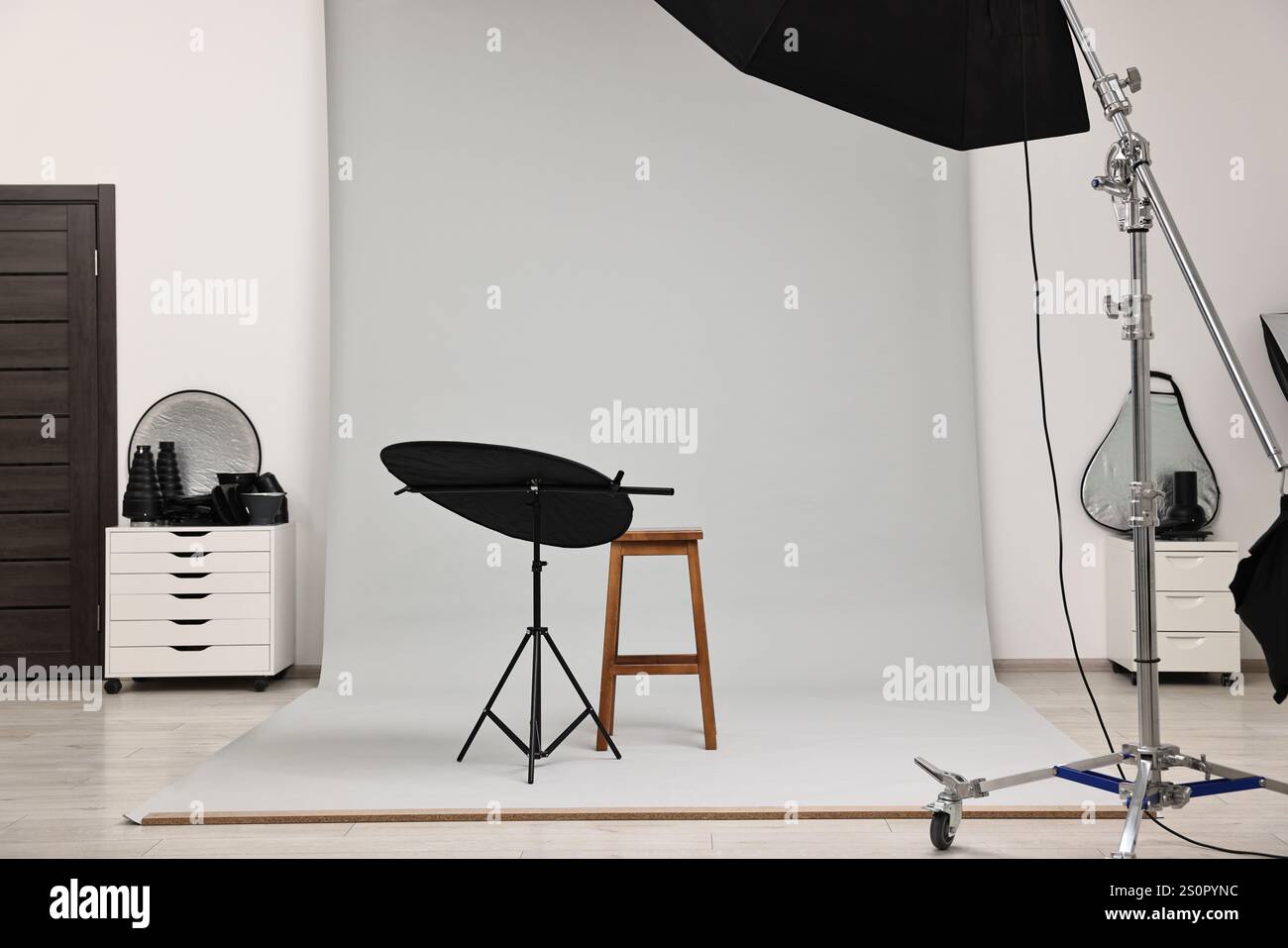 Professional lighting equipment setup in modern photo studio Stock ...