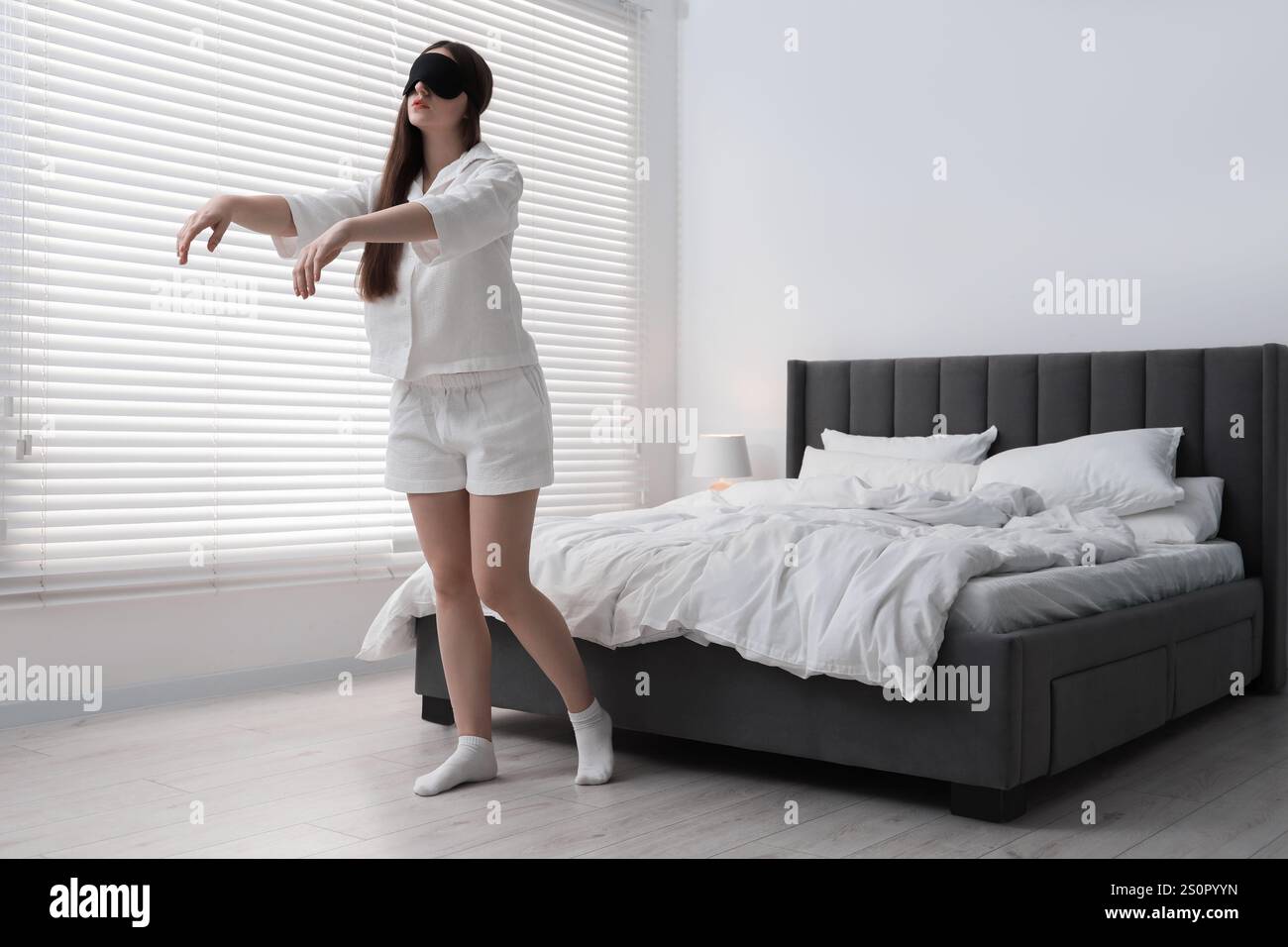 Young woman suffering from sleepwalking at home Stock Photo - Alamy