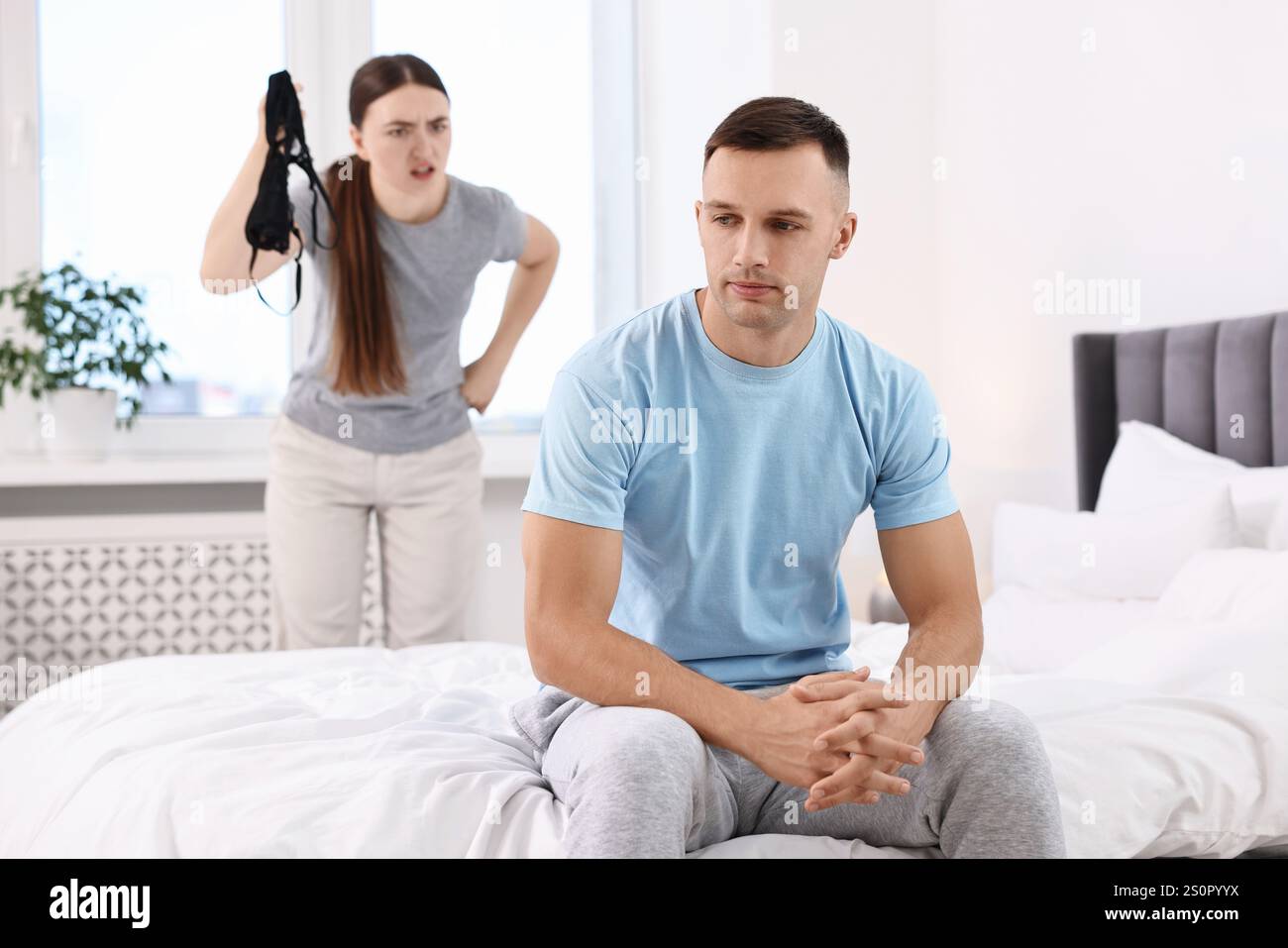 Angry wife showing mistress bra as proof to her unfaithful husband ...