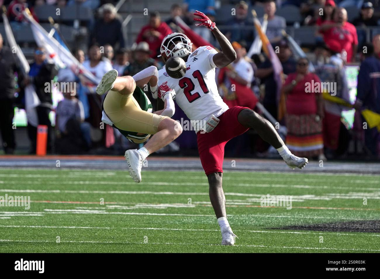 Miami (Ohio) defensive back Toney Coleman Jr. (21) knocks the ball away ...