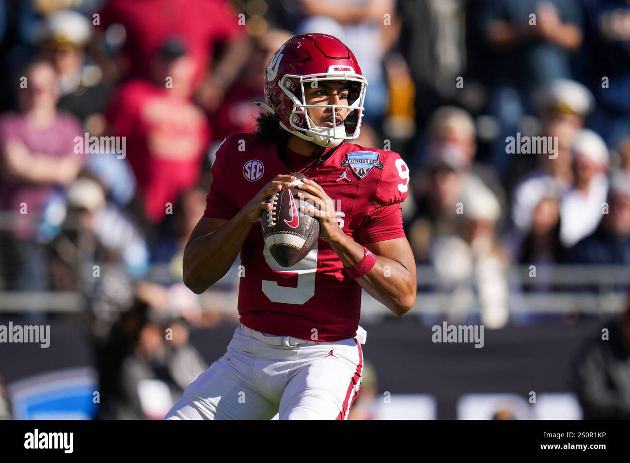 Oklahoma quarterback Michael Hawkins Jr. looks to pass against Navy ...