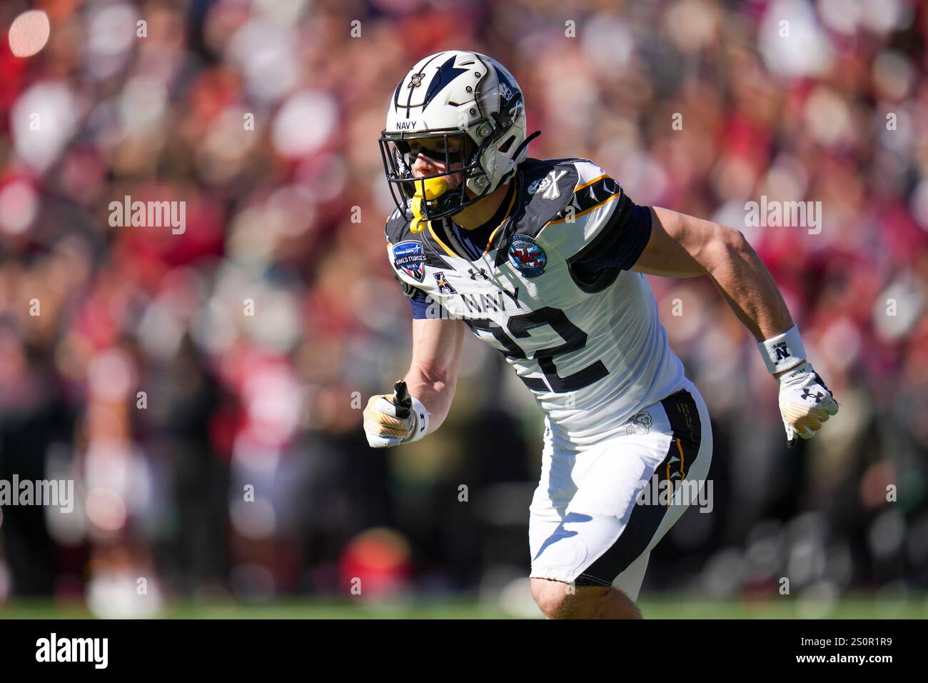 Navy running back Eli Heidenreich lines up for a play during the first ...
