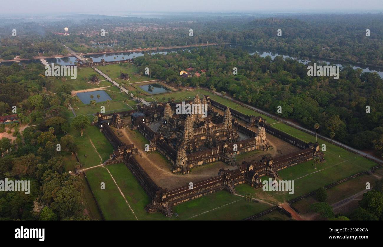 Siem Reap, Cambodia - April 2, 2023: Aerial view of Angkor Wat. The Buddhist temple complex is ...