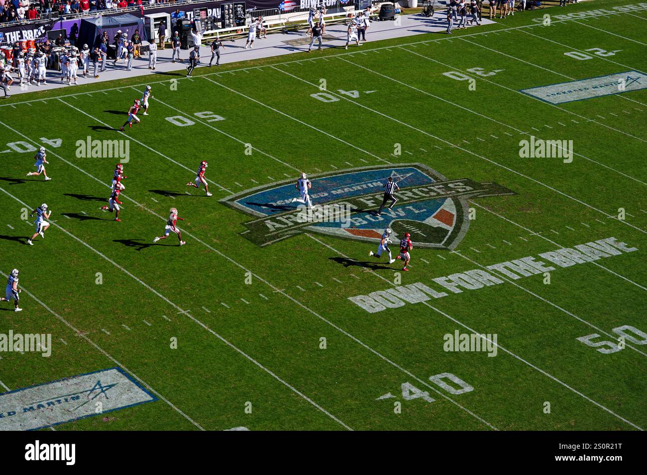 Navy quarterback Blake Horvath, center, runs for a 95-yard touchdown ...