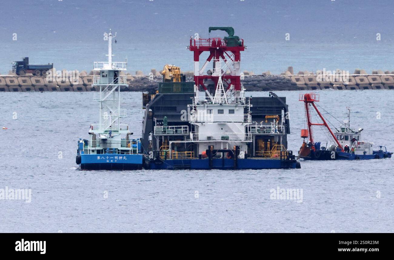 The work to improve the soft ground is seen in the area of Oura Bay ...