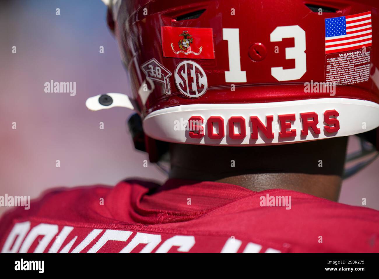 The helmet of Oklahoma defensive back Reggie Powers III is visible ...