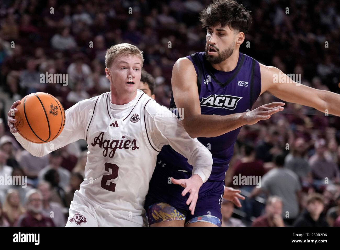 Texas A&M guard Hayden Hefner (2) drives the lane against Abilene ...