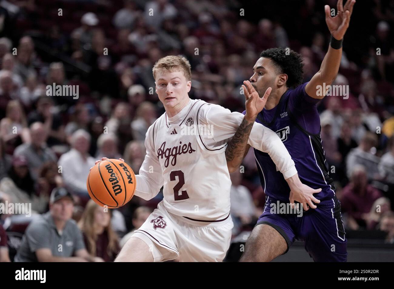 Texas A&M guard Hayden Hefner (2) drives the lane against Abilene ...