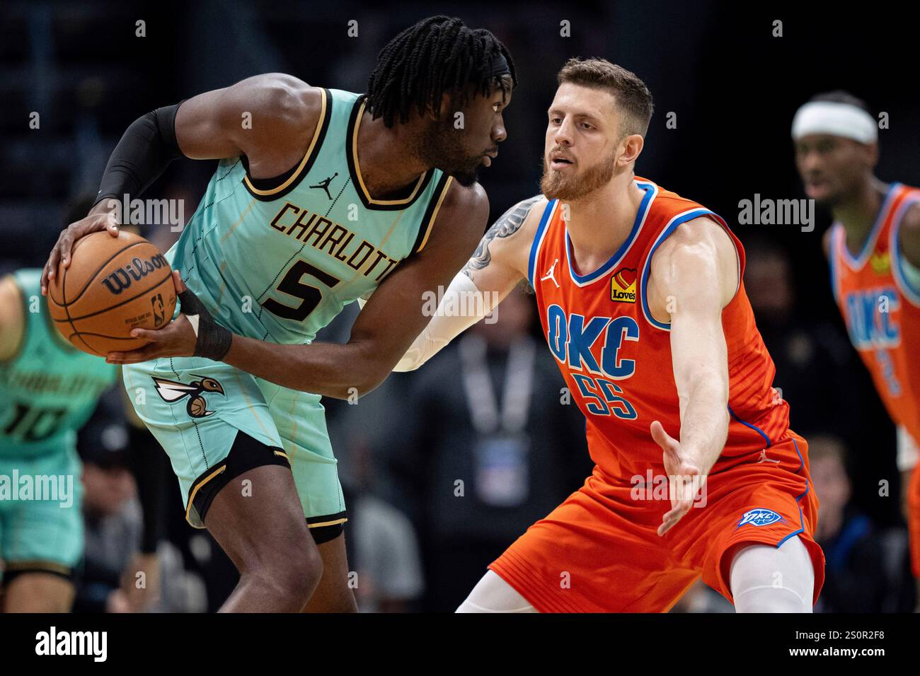 Oklahoma City Thunder center Isaiah Hartenstein (55) guards Charlotte ...