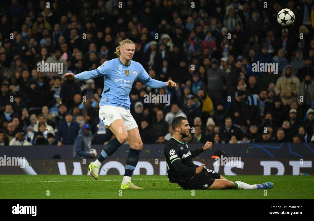 Erling Haaland, Dávid Hancko in action during the UEFA 2024 Champions ...