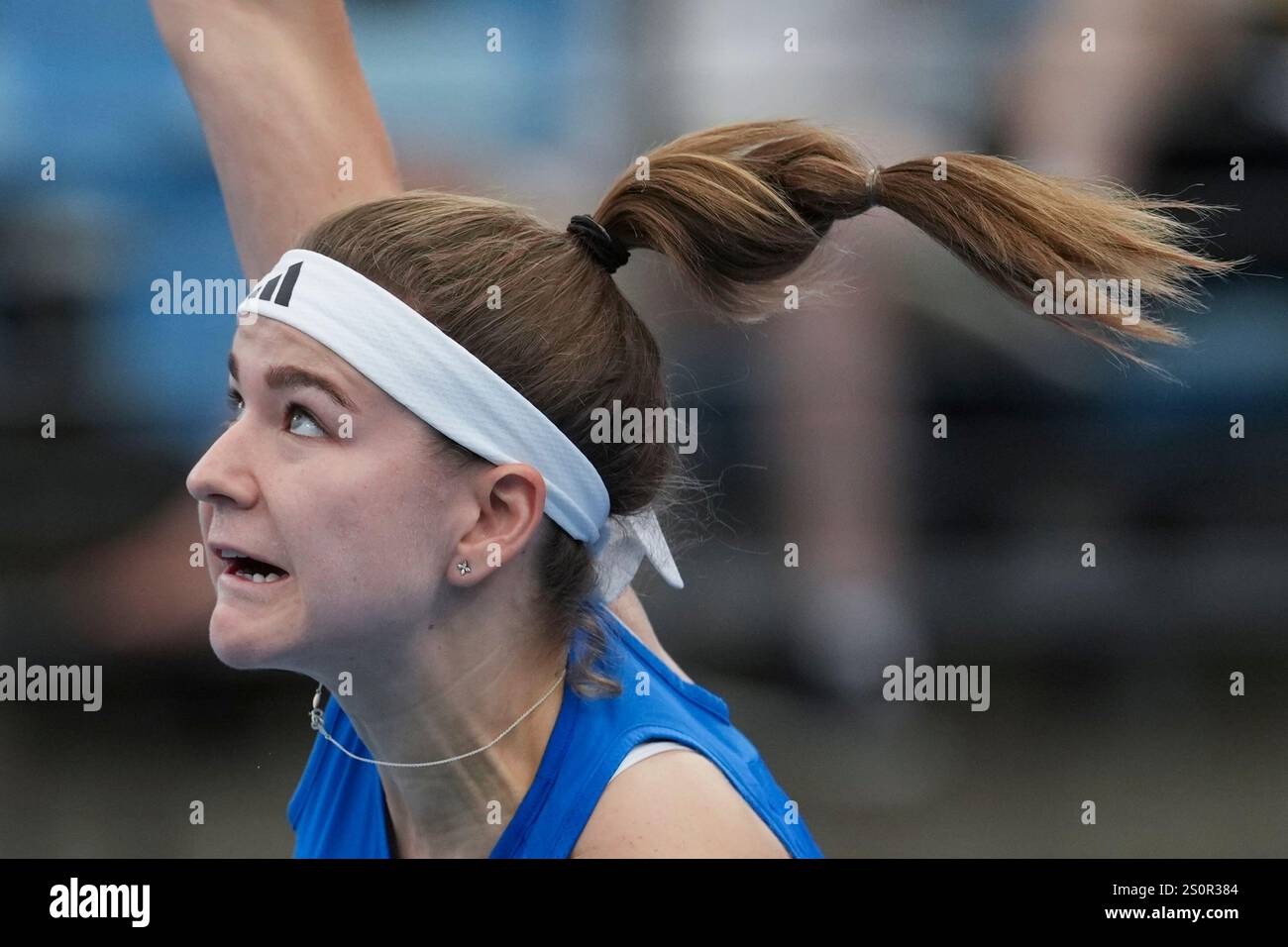 Czech Republic's Karolina Muchova serves to Norway's Malene Helgo ...