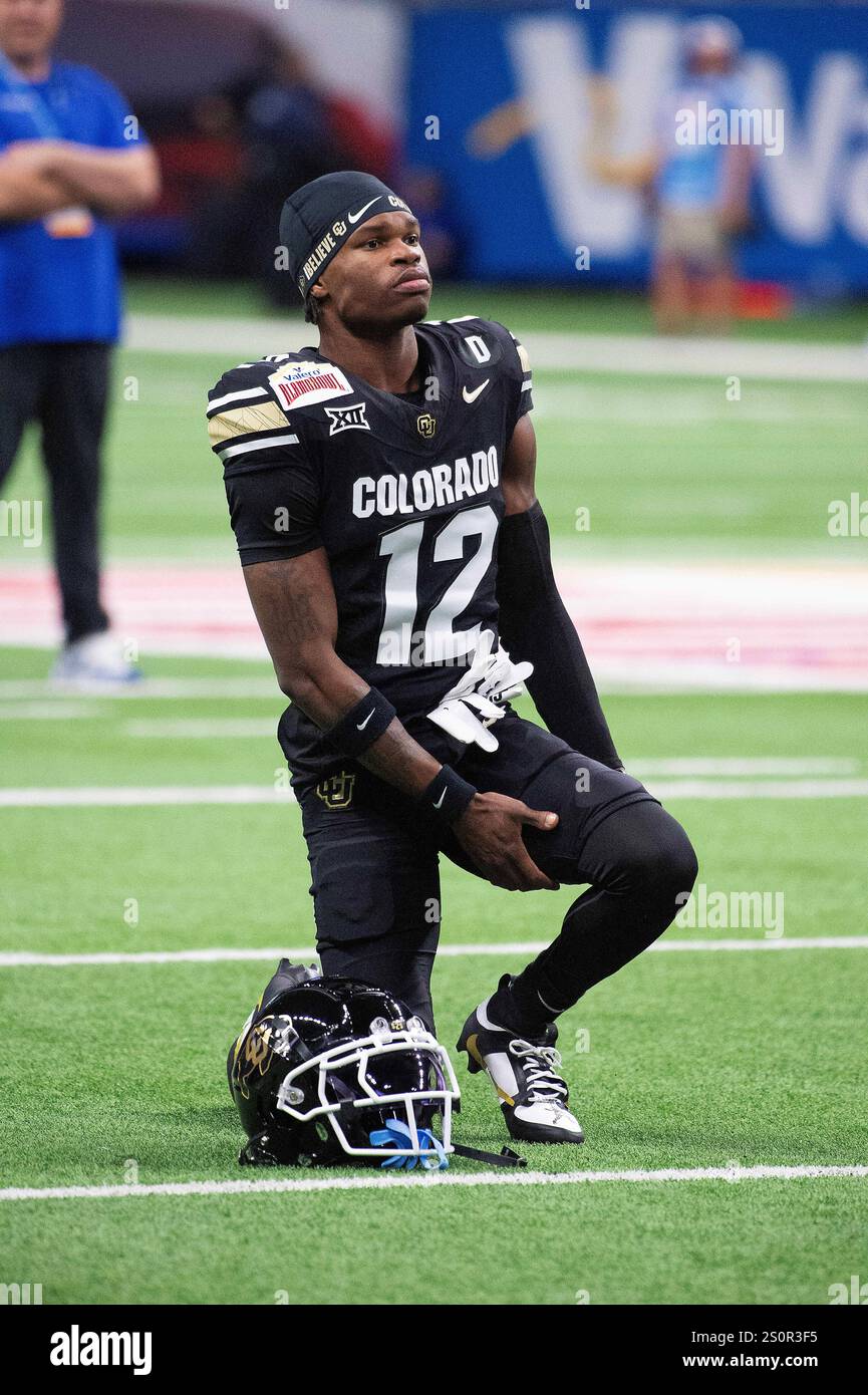 December 28, 2024: Travis Hunter (12) of the University of Colorado pre ...
