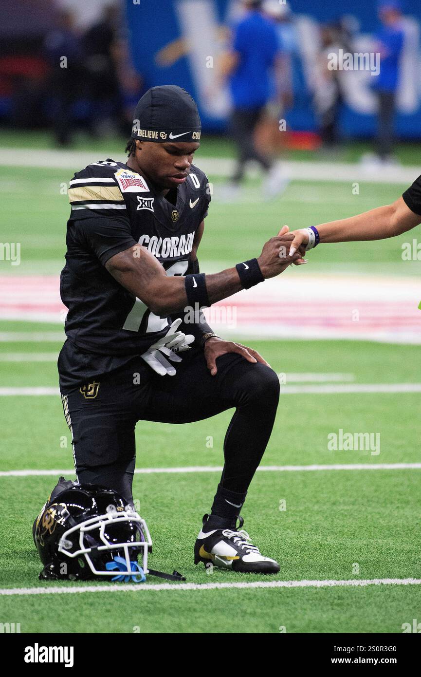 December 28, 2024: Travis Hunter (12) of the University of Colorado pre ...