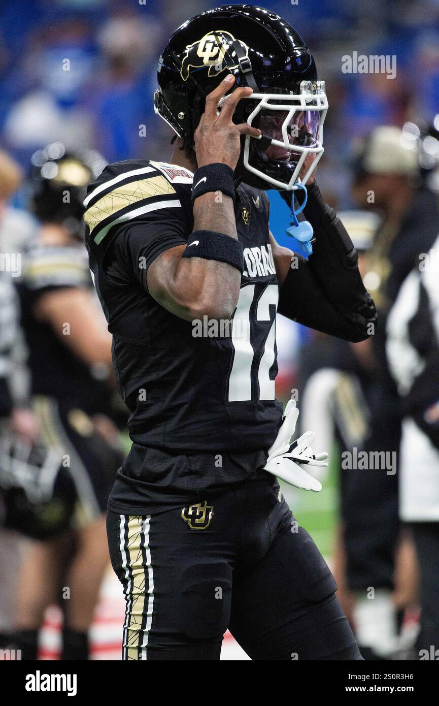 December 28, 2024: Travis Hunter (12) of the University of Colorado pre ...