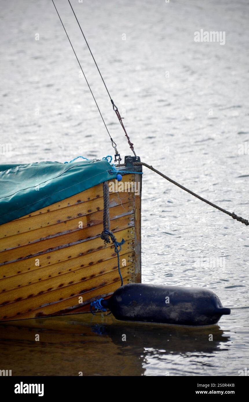 clinker built wooden sailing dinghy hull moored at blakeney, north ...