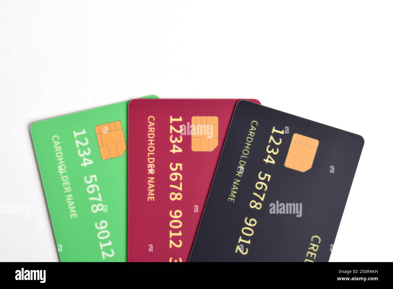 Three credit cards with chip on white background. Green, red, black ...