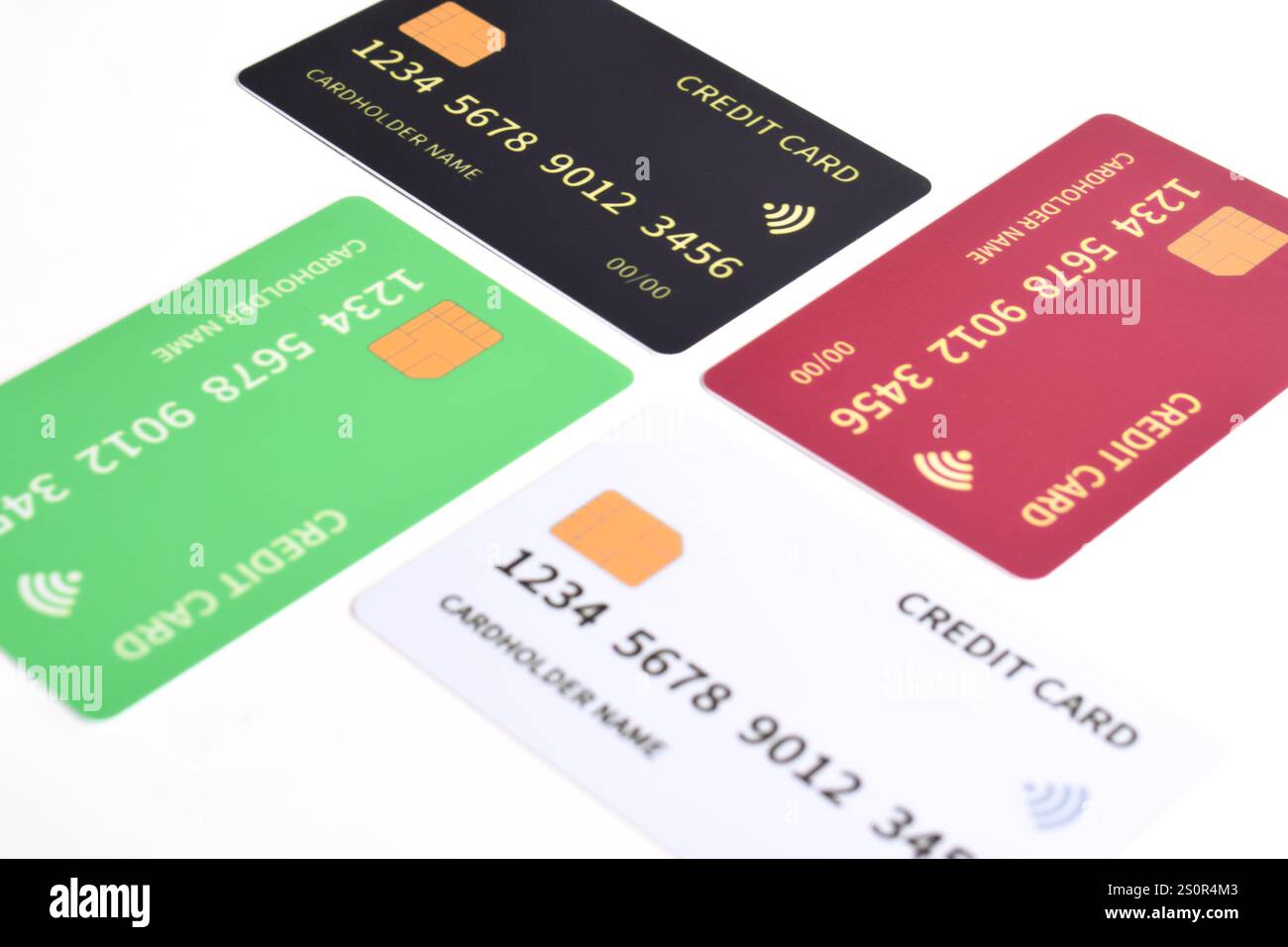 Four credit cards with chip on white background Stock Photo - Alamy