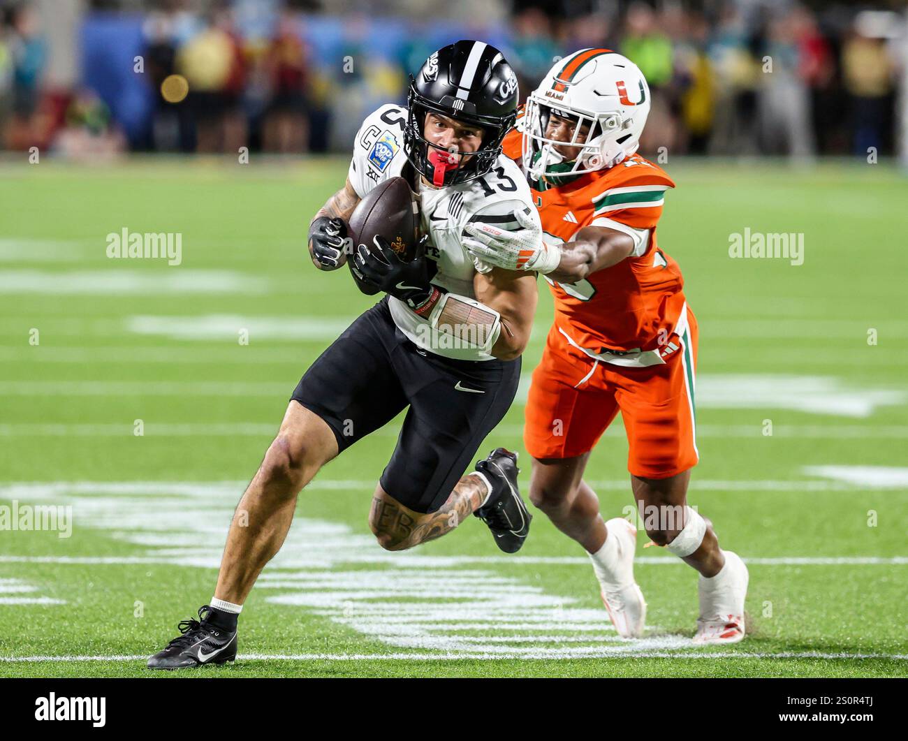 December 28, 2024: Iowa State's Jaylin Noel (13) dashes toward the ...