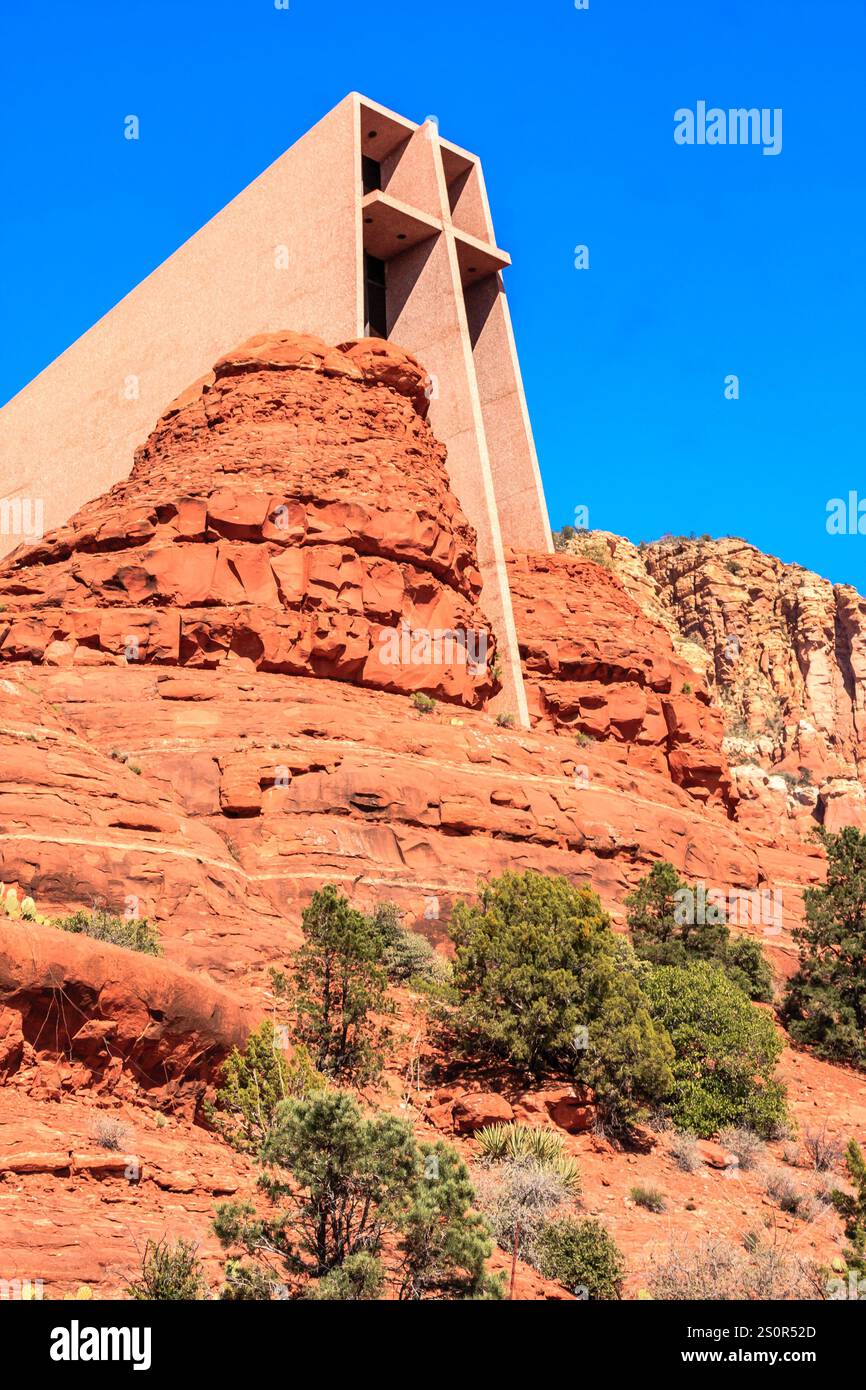 A large rock formation with a church on top of it. The church is a ...