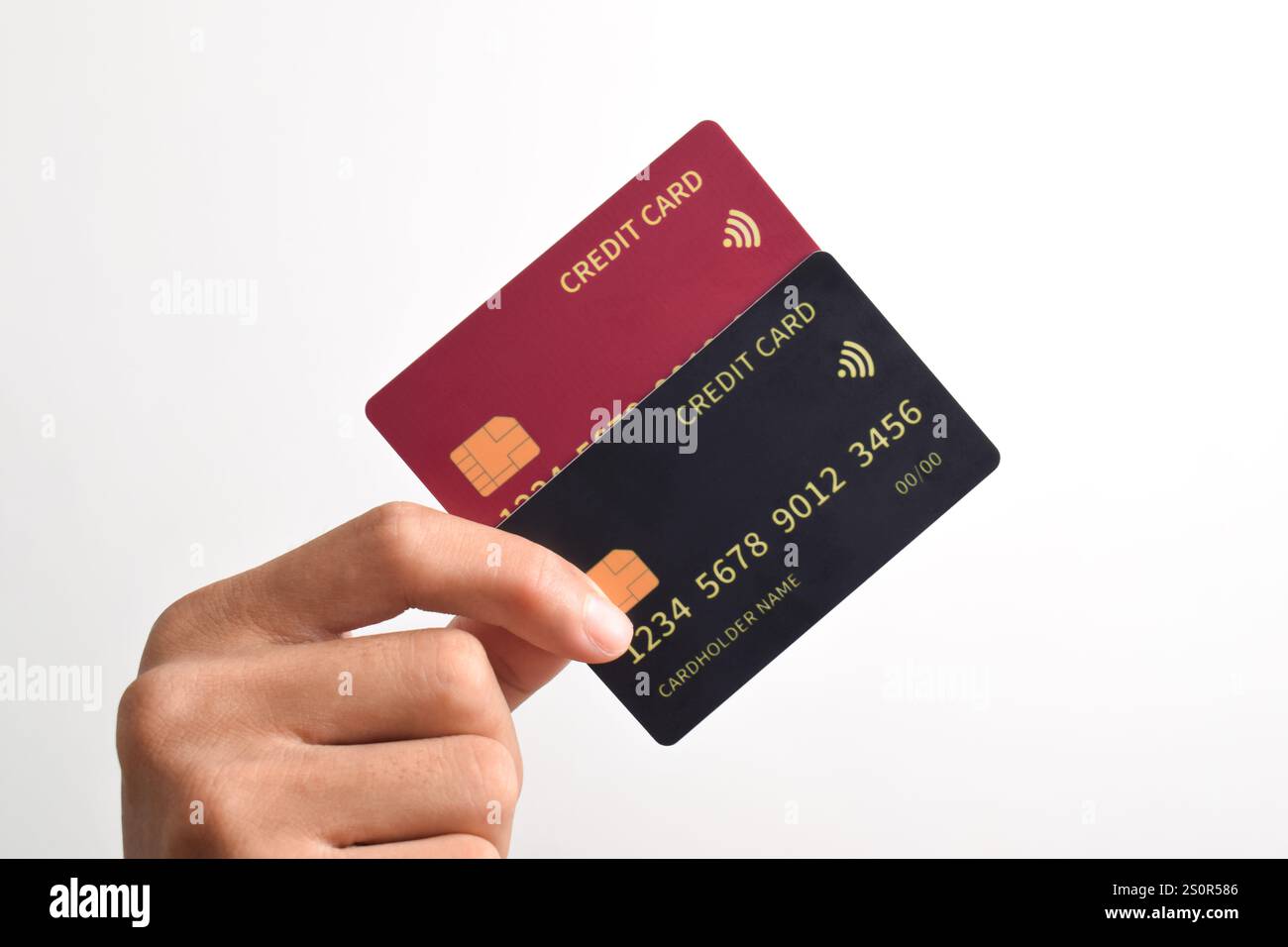 Hand holding two credit cards and other hand receiving isolated on ...
