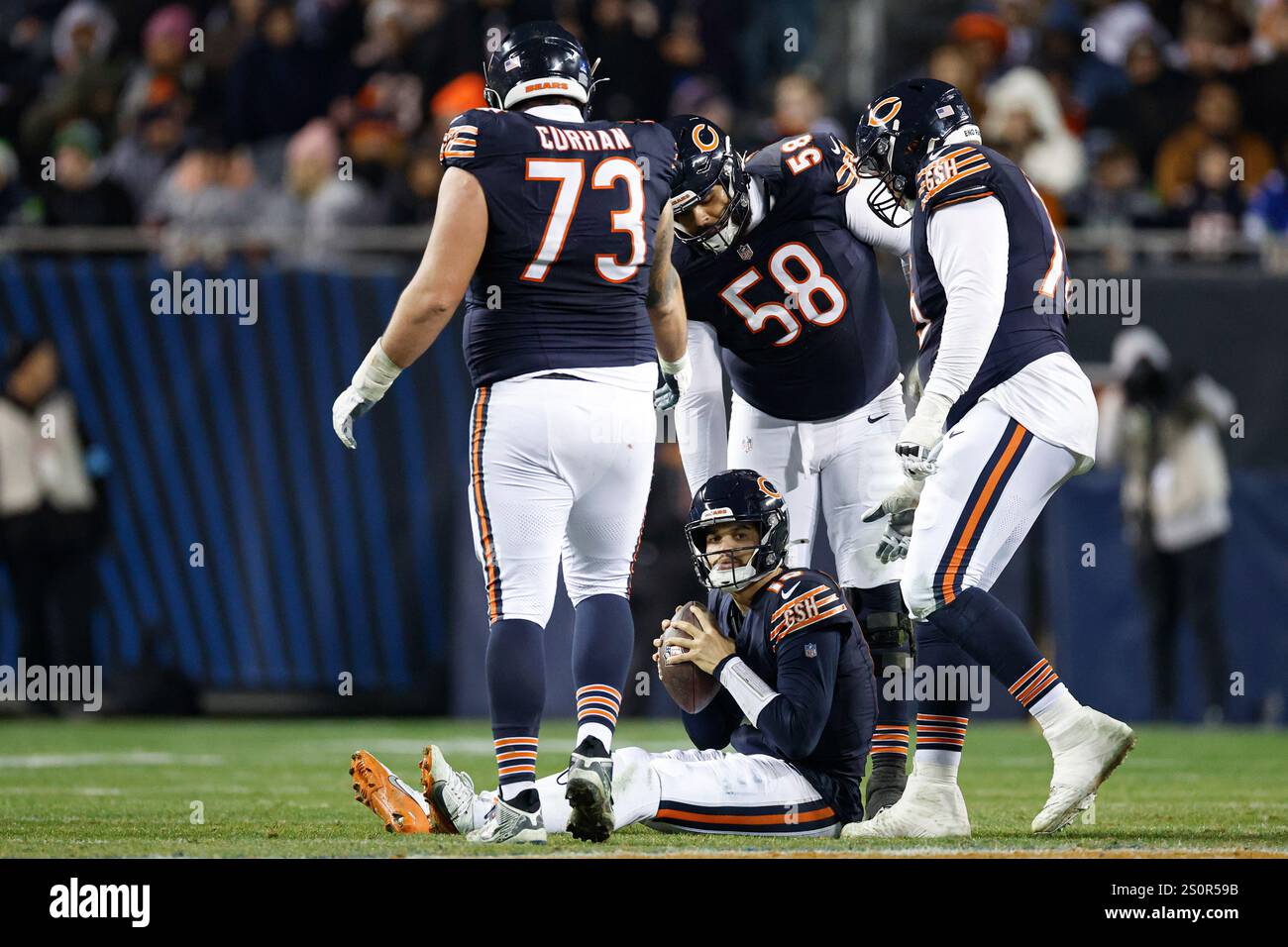 Chicago Bears quarterback Caleb Williams (18) reacts after being sacked ...