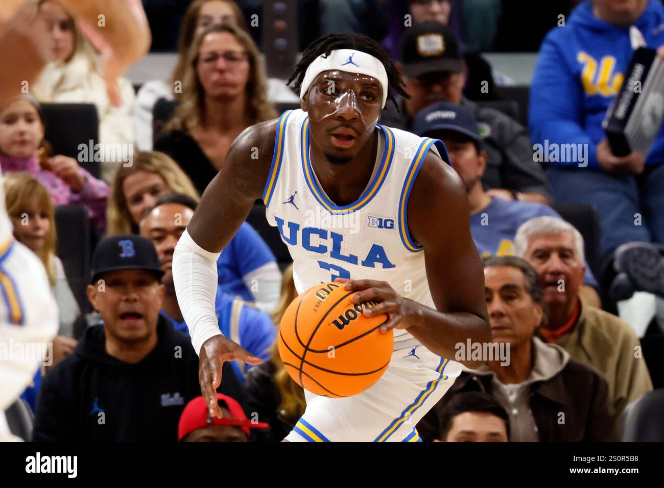 UCLA's Eric Dailey Jr. dribbles during the first half of an NCAA ...