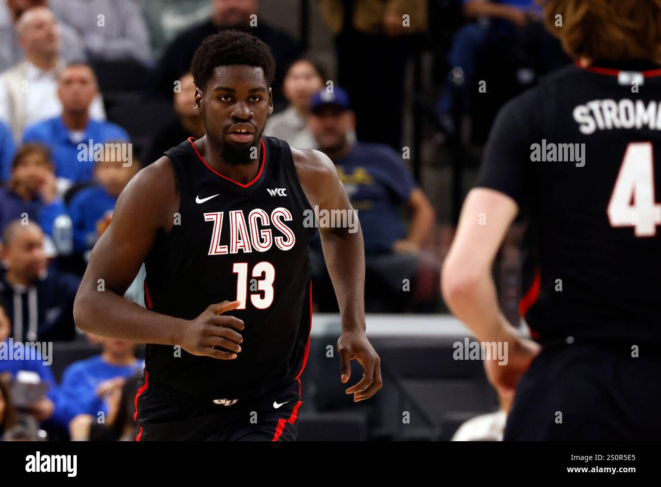 Gonzaga Bulldogs' Graham Ike runs forward during the first half of an ...