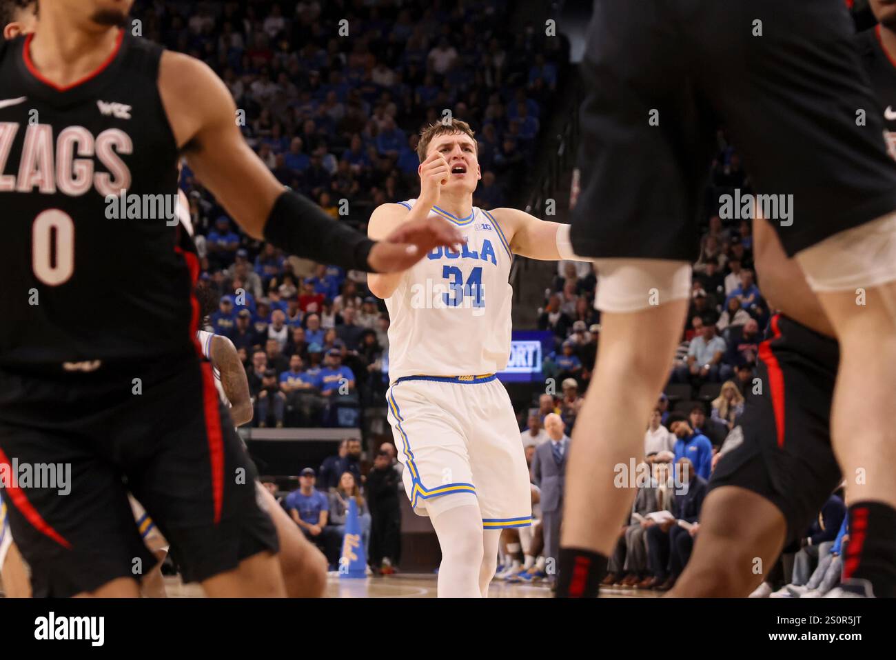 UCLA's Tyler Bilodeau reacts during the first half of an NCAA college ...