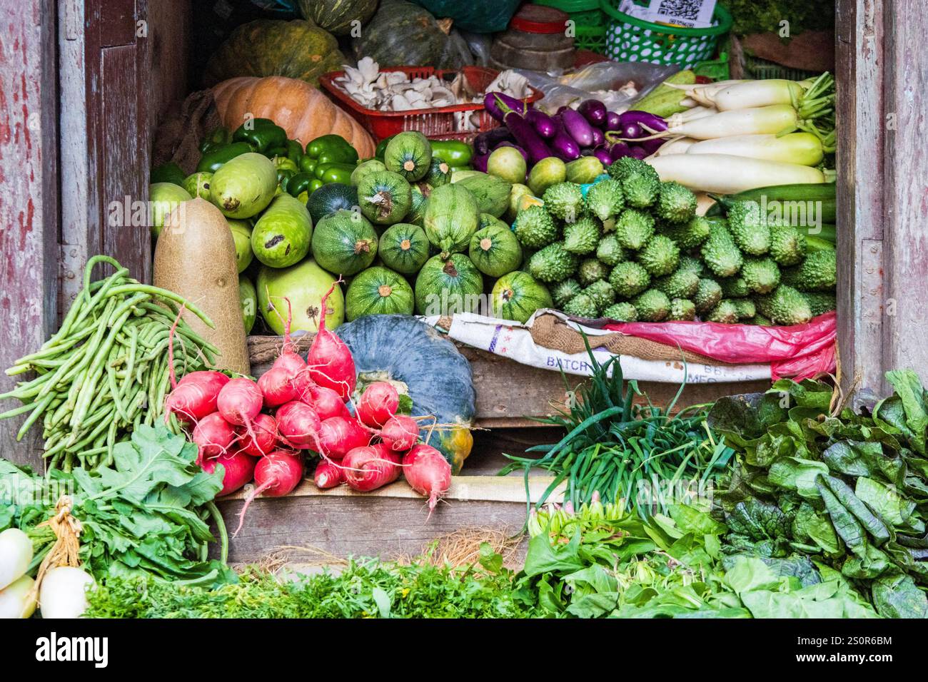 Nepalese produce, vegetables, on display in a shop window, Dhulikhel ...