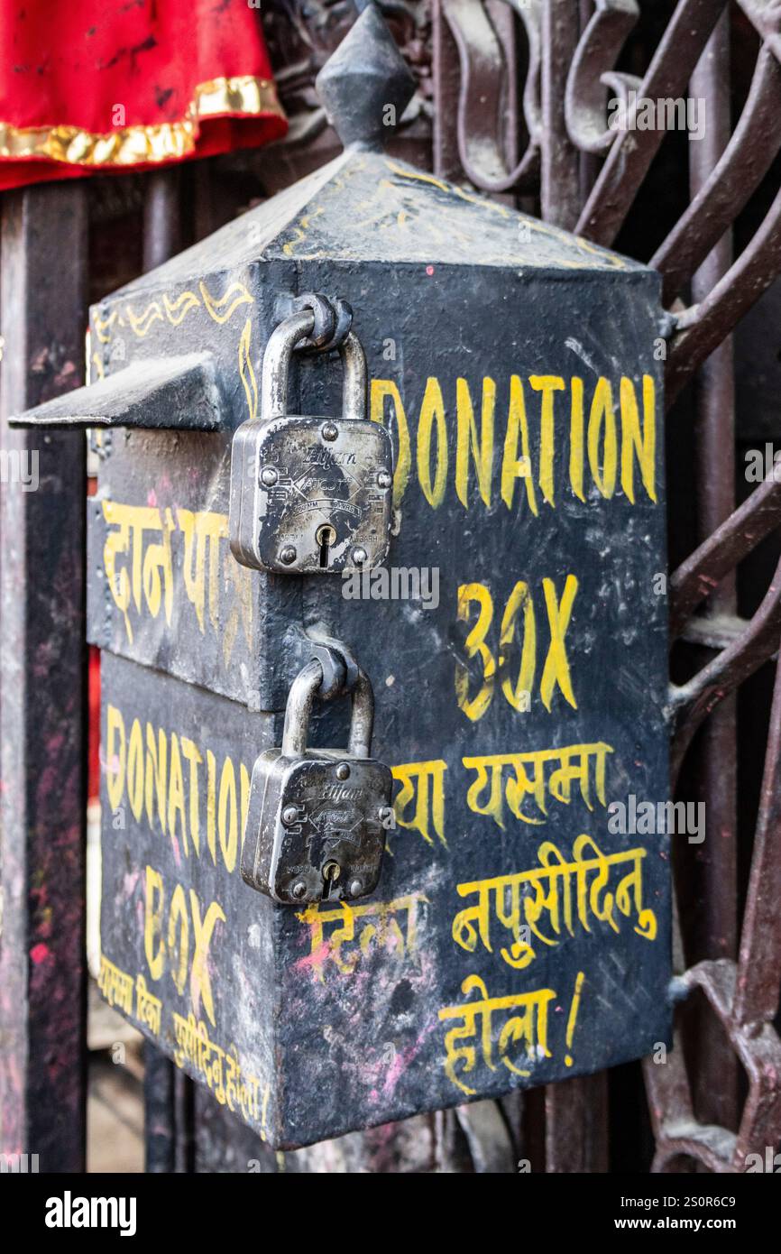 Donation box with two strong padlocks in a hindu temple, Dhulikhel ...
