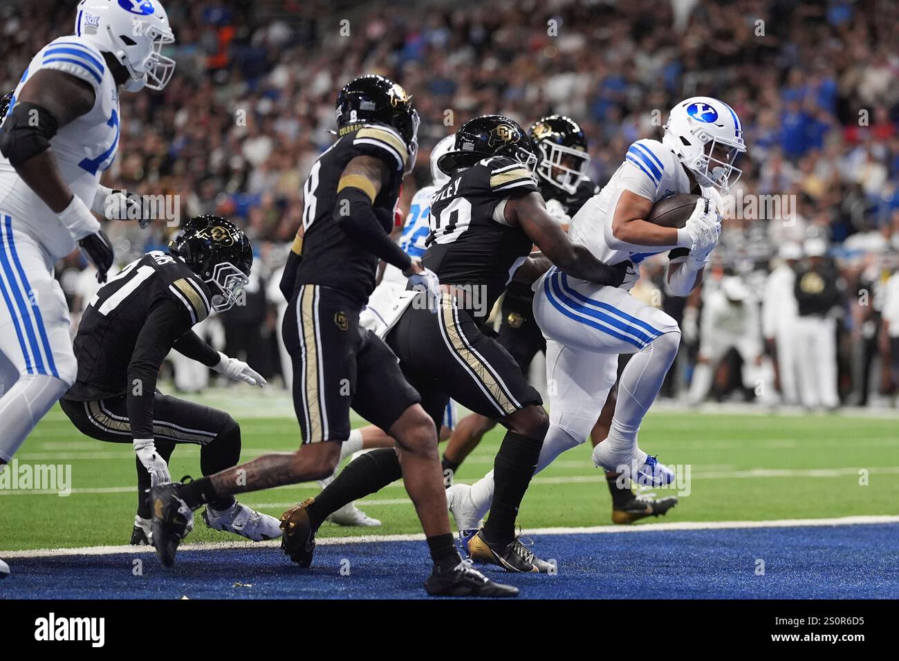 BYU running back LJ Martin, right, scores against Colorado during the ...