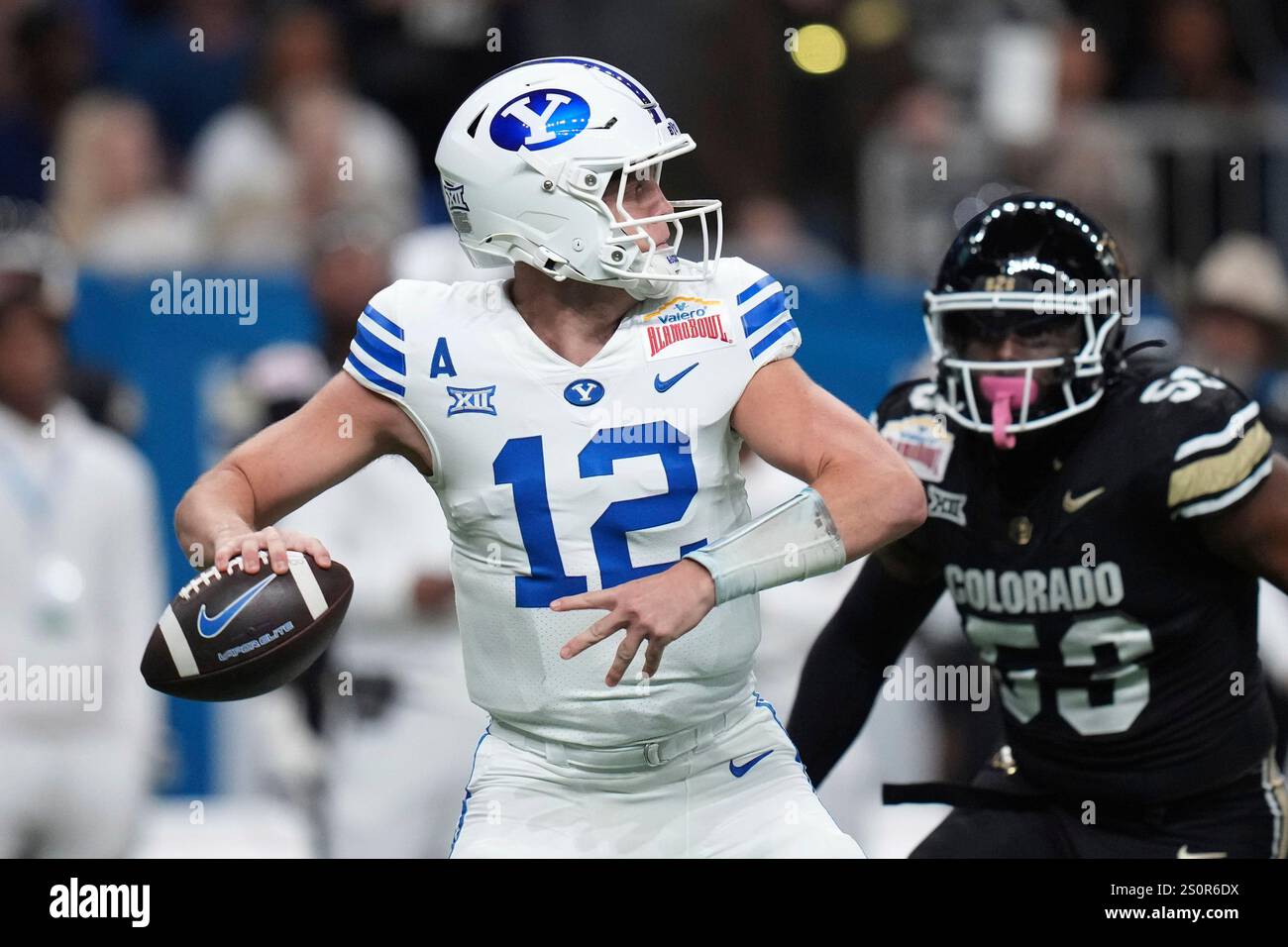BYU quarterback Jake Retzlaff (12) looks to throw against Colorado ...
