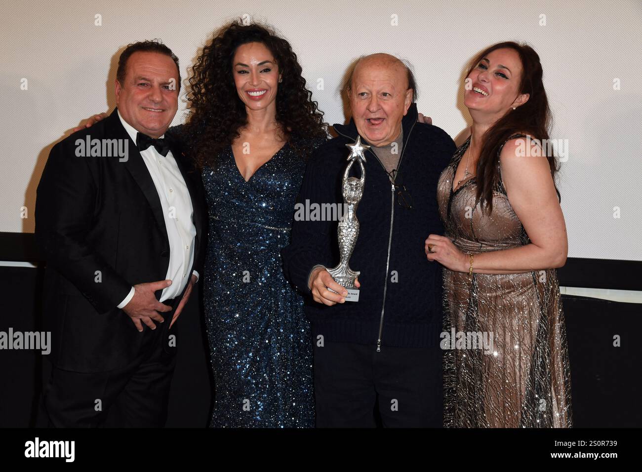 Capri, Italy. 27th Dec, 2024. Raffaella Fico, Massimo Boldi, Isabella ...