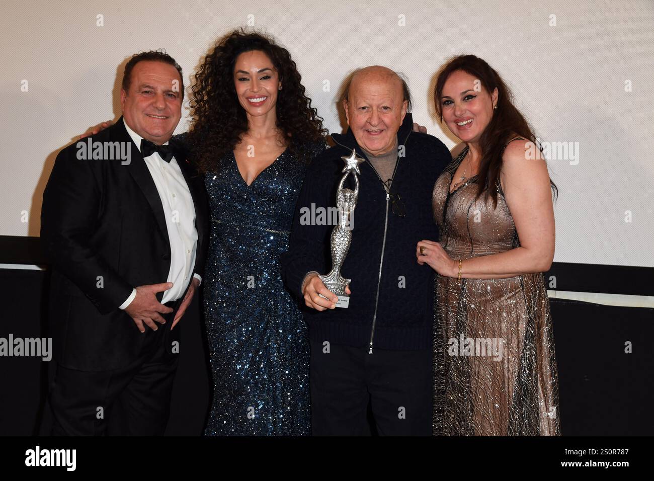 Capri, Italy. 27th Dec, 2024. Raffaella Fico, Massimo Boldi, Isabella ...