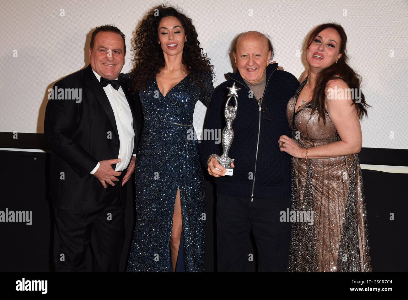 Capri, Italy. 27th Dec, 2024. Raffaella Fico, Massimo Boldi, Isabella ...