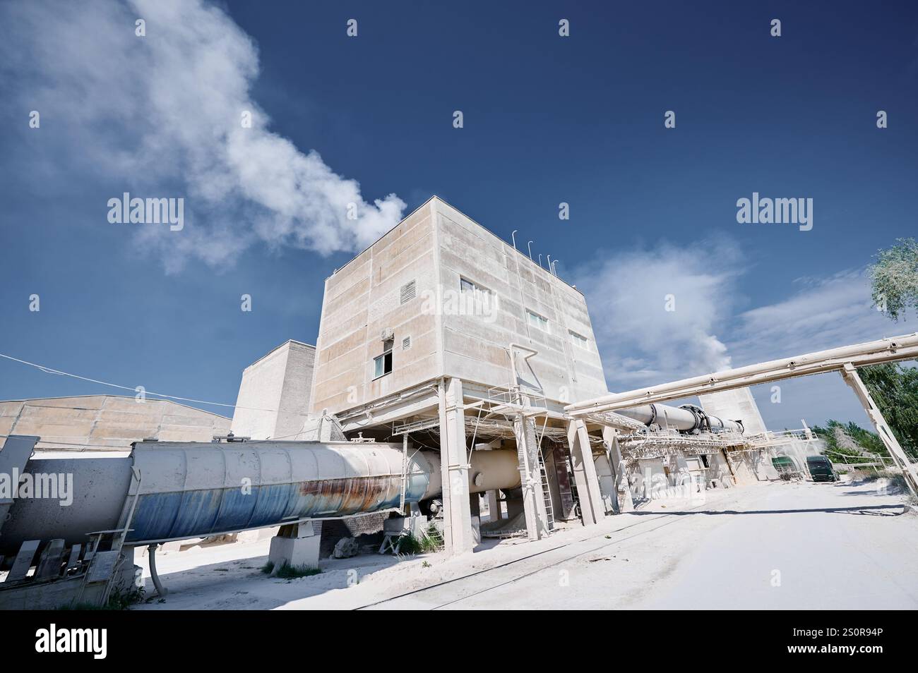 Building of loading device of roasting rotary furnace Stock Photo - Alamy