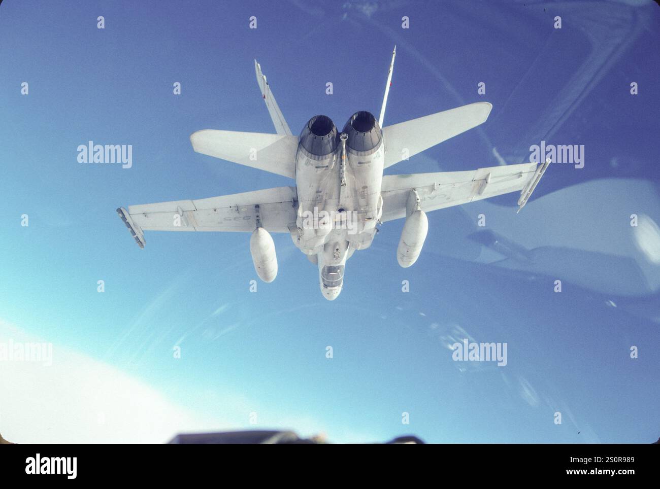 Aerial photo of Canadian CF-18 Hornet enroute to Military Training Area ...