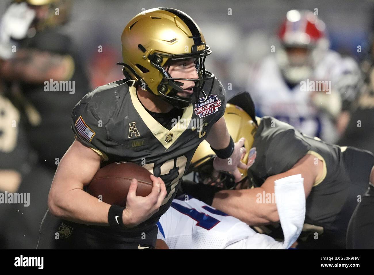 Army quarterback Bryson Daily (13) runs for a first down against ...