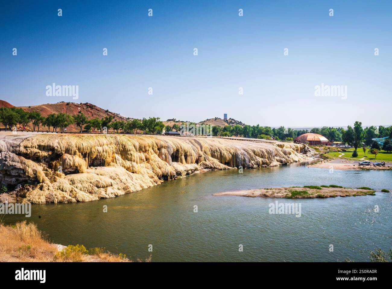 Thermopolis WY USA - August 22, 2017: Layers of mineral deposits border ...