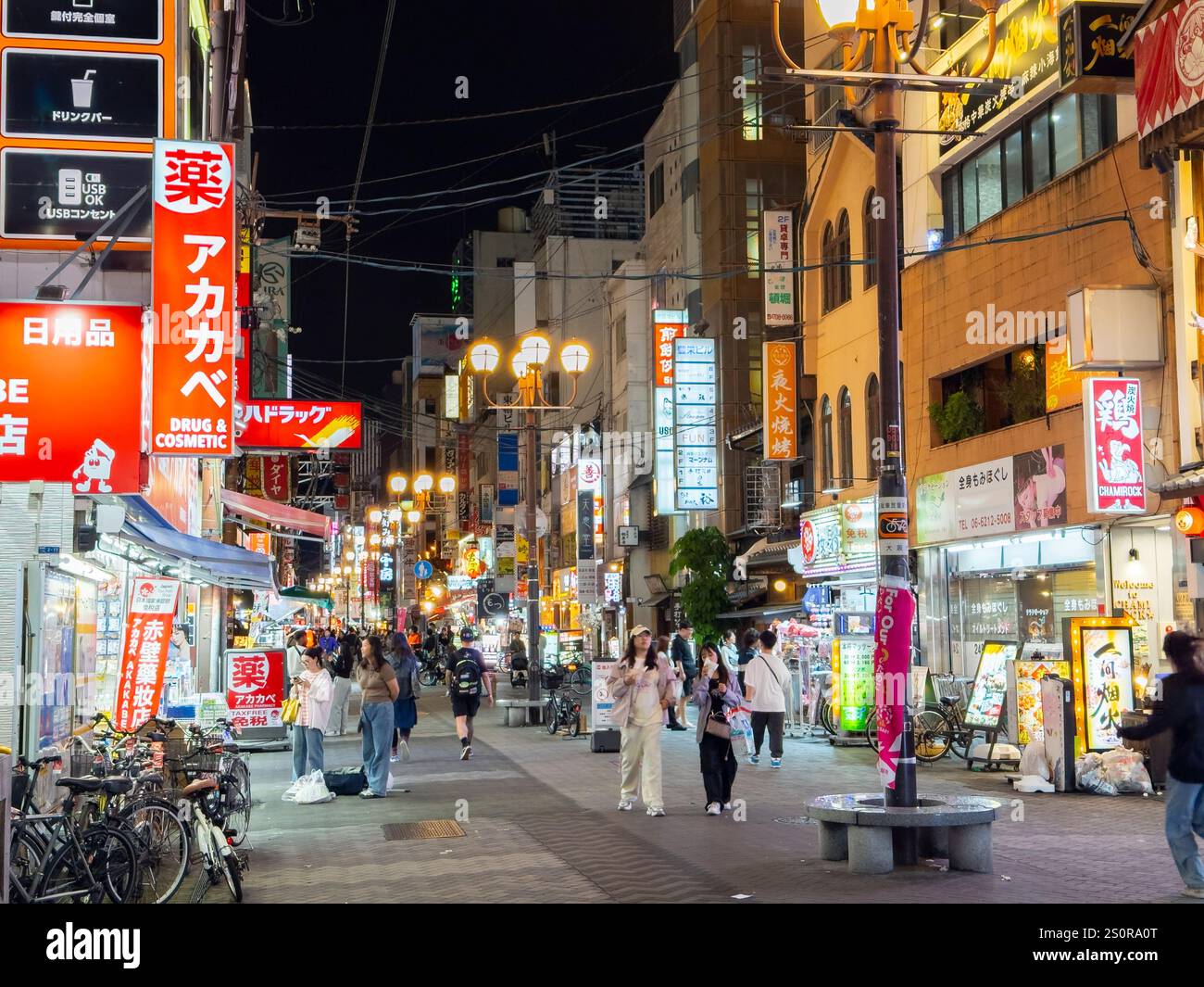 Modern commercial shops and restaurant at night on Dotonbori Street in ...