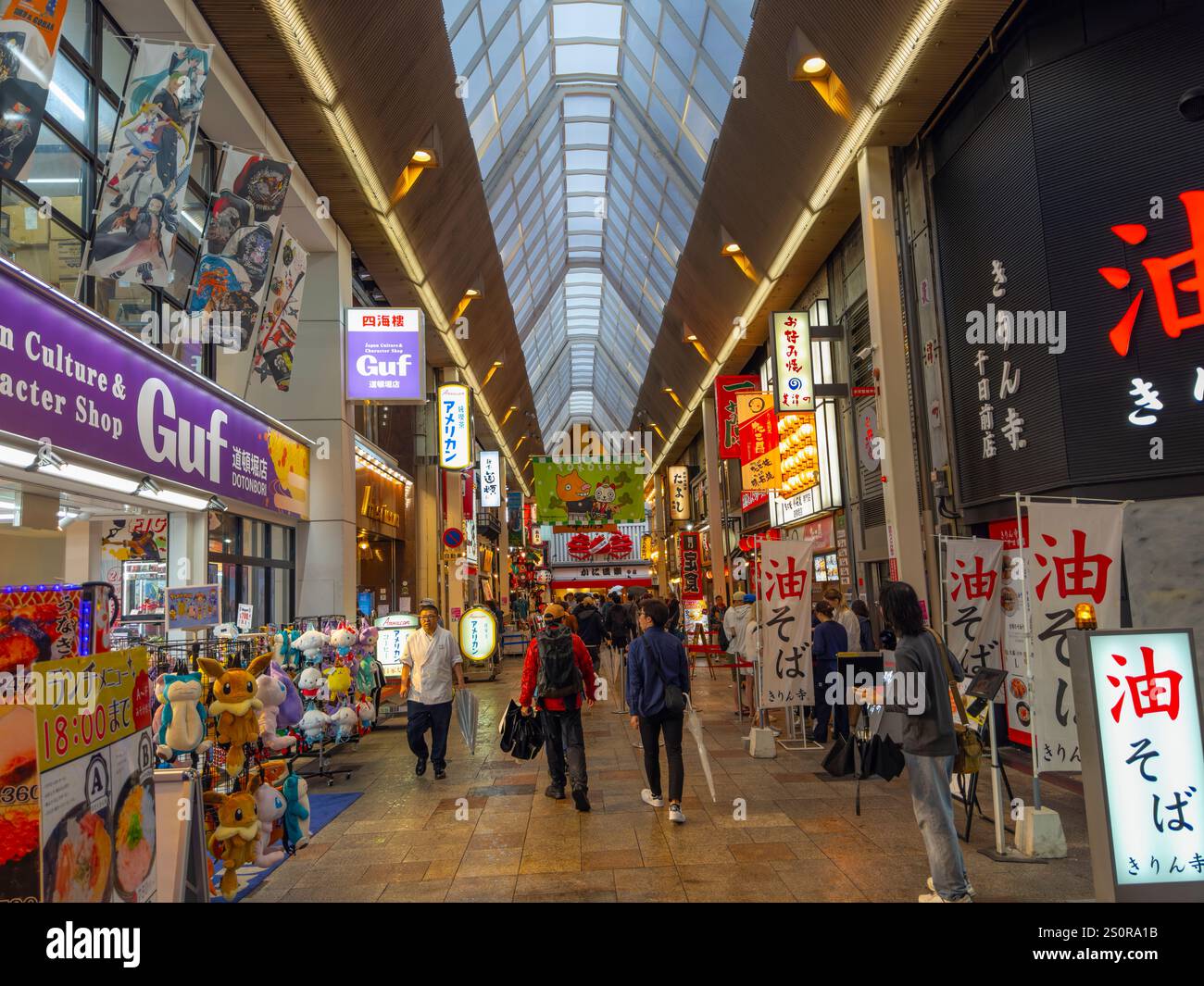 Japanese style shops and restaurants on Sennichimae Street at Dotonbori ...