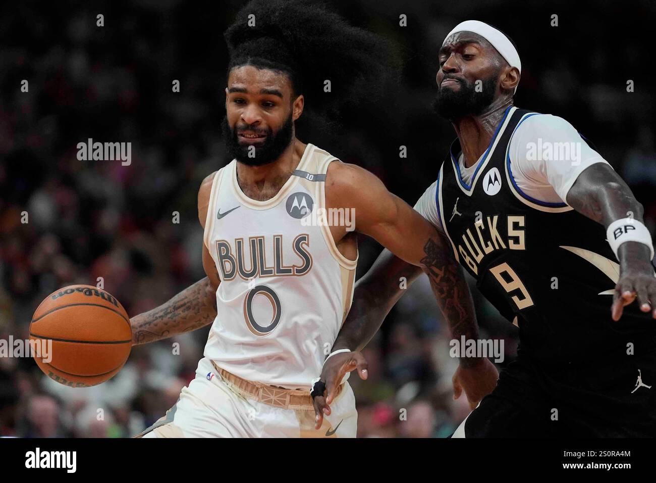 Milwaukee Bucks forward Bobby Portis Jr., right, guards against Chicago ...