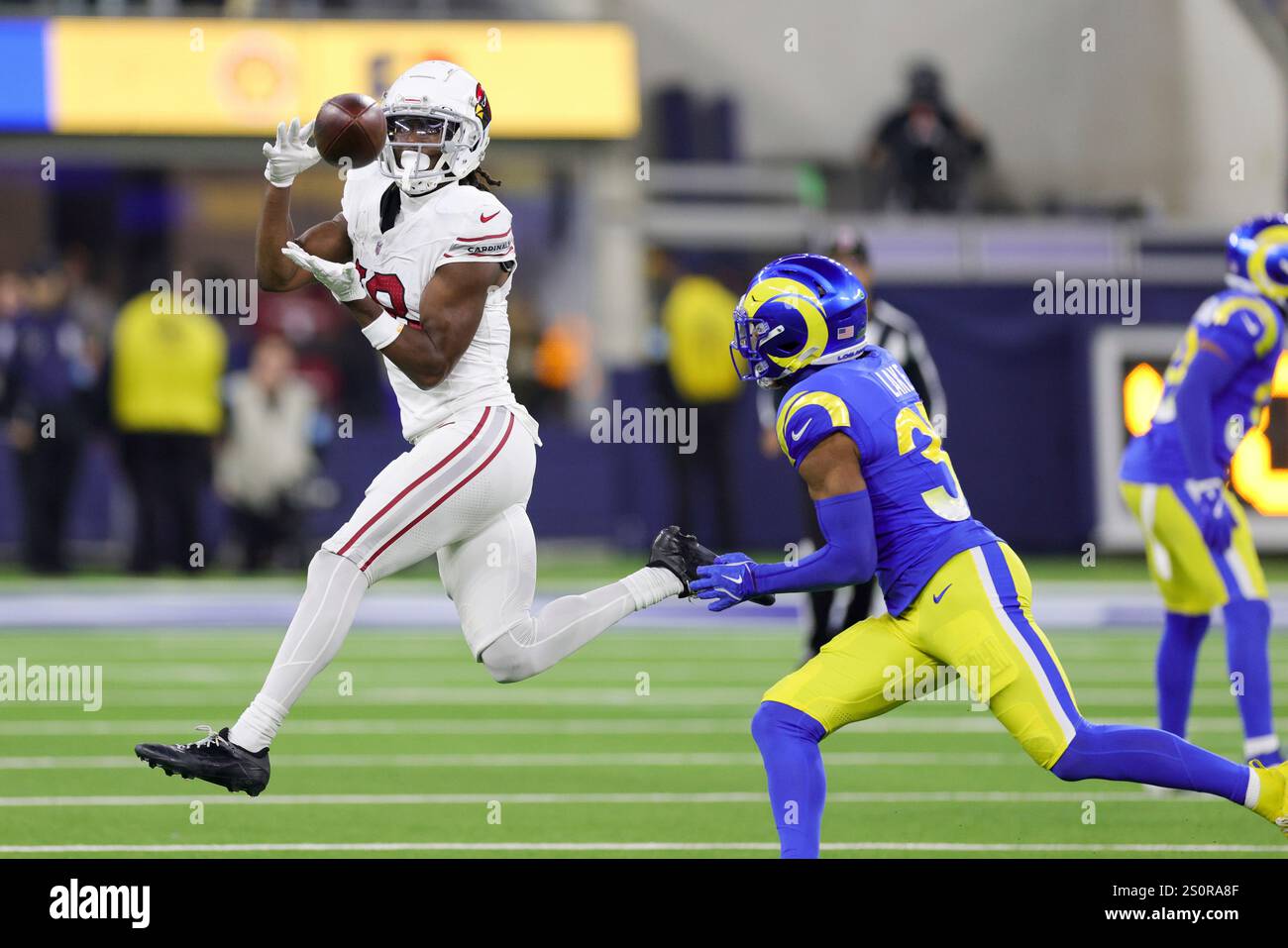 Arizona Cardinals wide receiver Marvin Harrison Jr., left, makes a ...