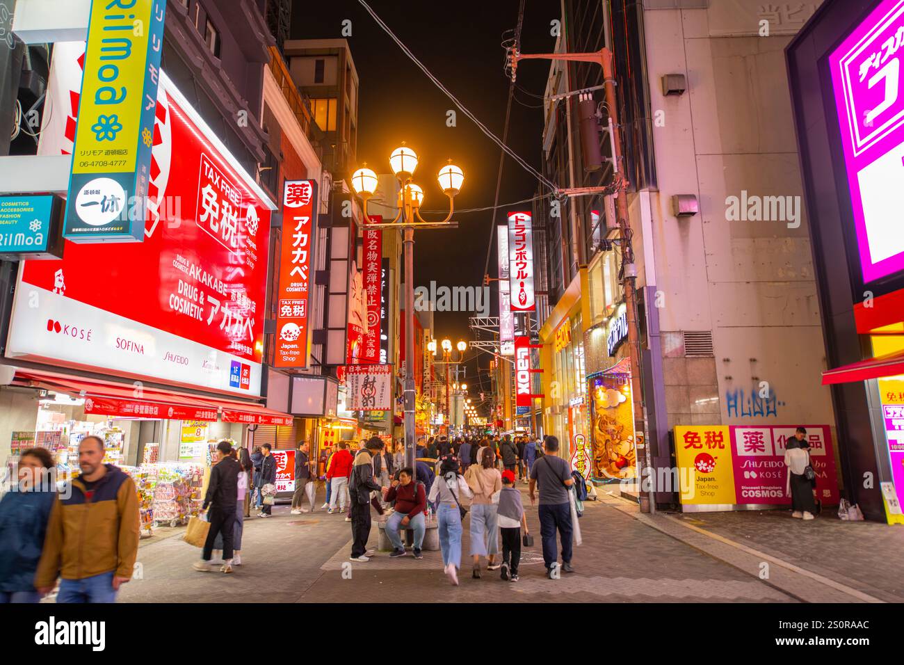 Modern commercial shops and restaurant at night on Dotonbori Street in ...