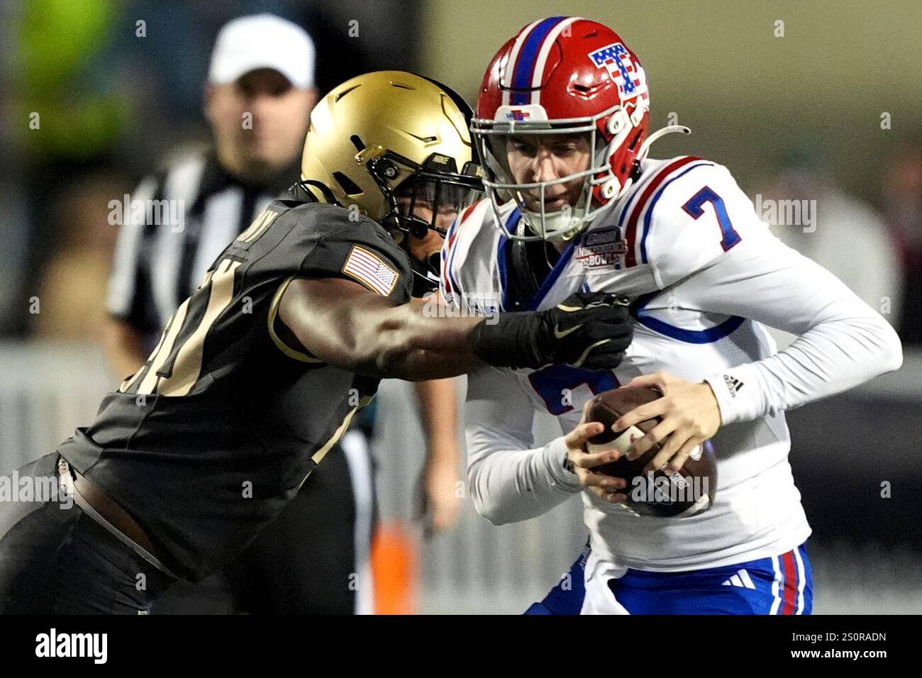 Army linebacker Eric Ford, left, rushes Louisiana Tech quarterback Evan ...